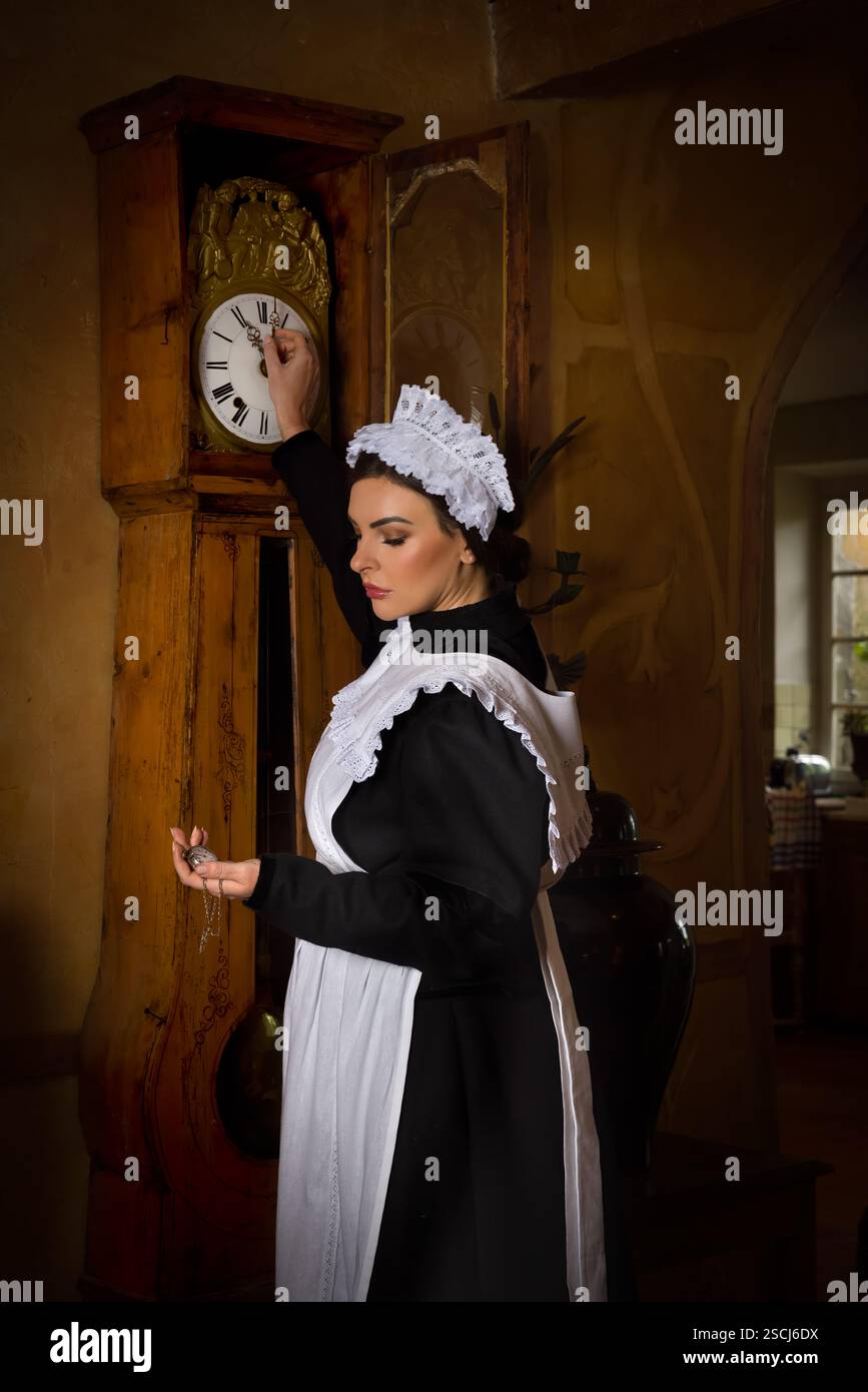 Scenes of a beautiful young Victorian maid doing house chores in an ...