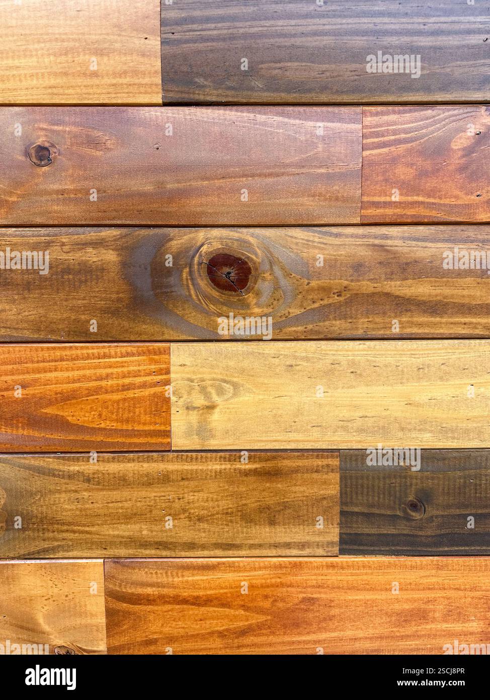 Wall paneling texture background.Layered wood plank wall in different ...