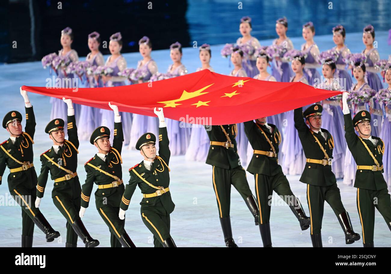 Harbin, China's Heilongjiang Province. 7th Feb, 2025. Flagbearers carry ...