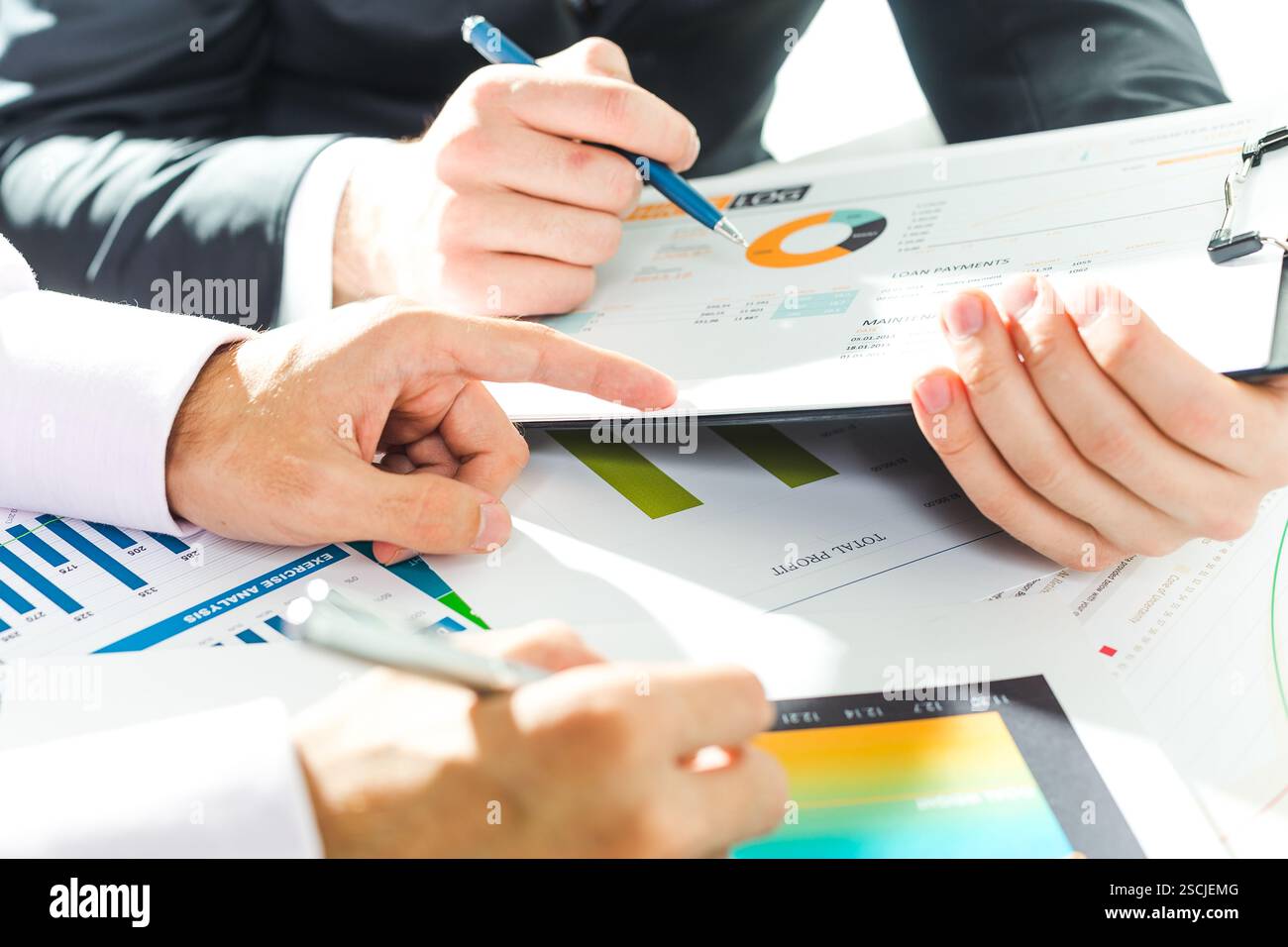 Meeting focused on data analysis and strategy development at a modern ...
