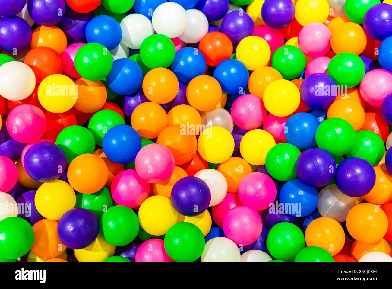 A colorful collection of plastic balls creating a fun-filled ball pit ...