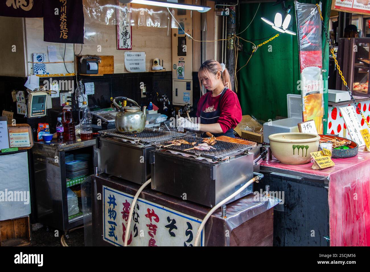 A street food vendor selling assorted rice bowls in Fushimi, Kyoto ...
