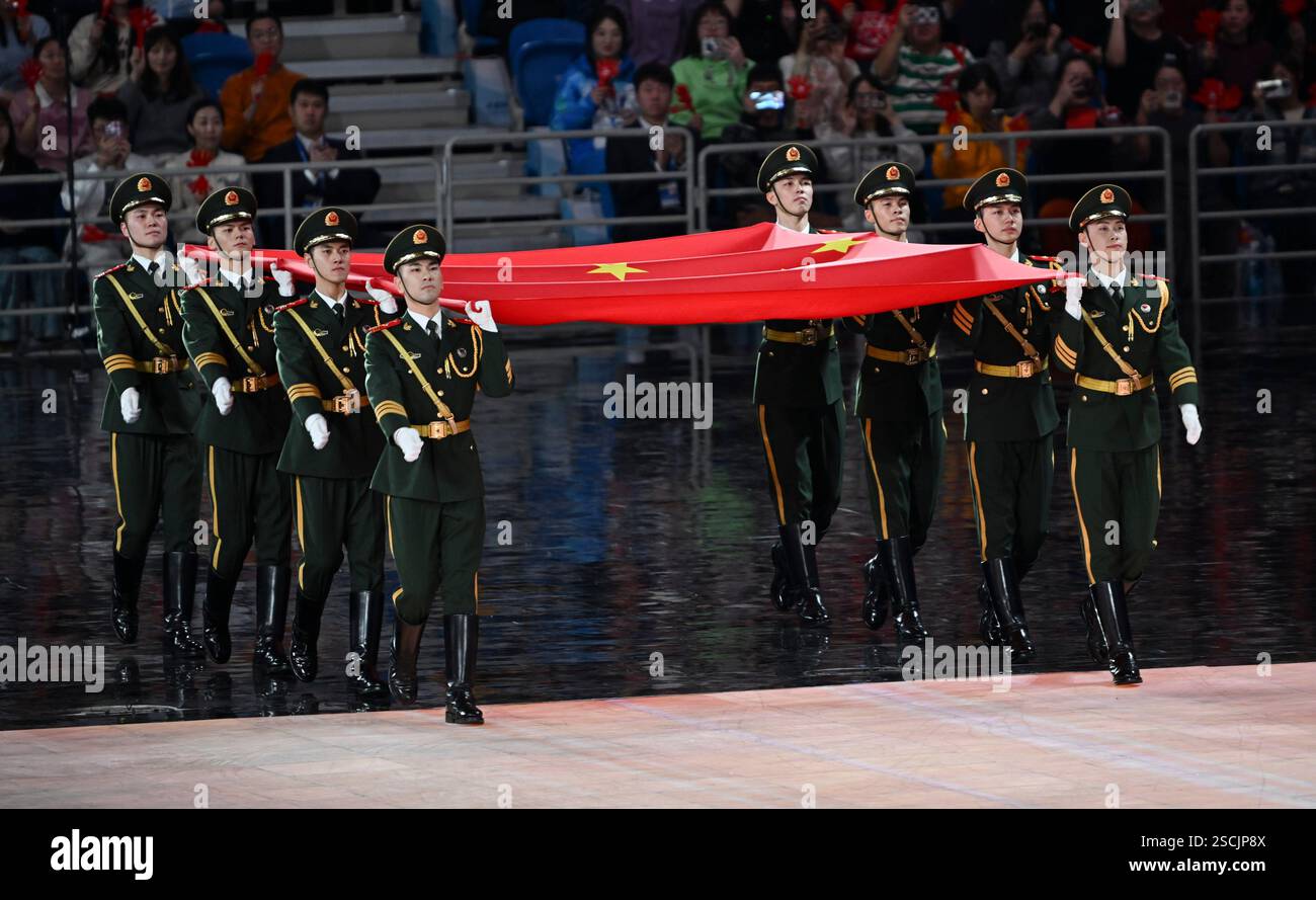 Harbin, China's Heilongjiang Province. 7th Feb, 2025. Flagbearers carry ...