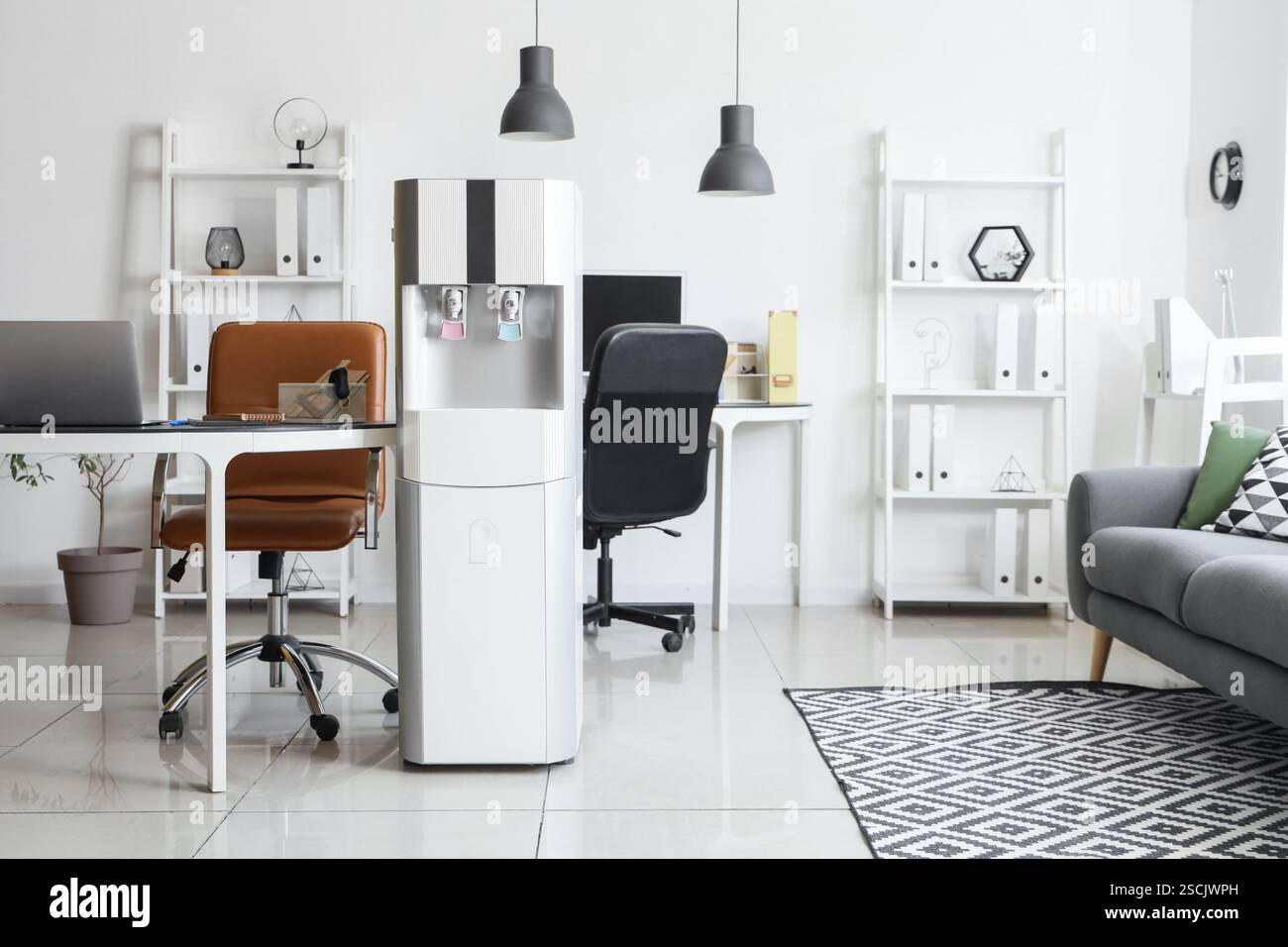 Interior of modern office with workplace, shelf units and water cooler ...