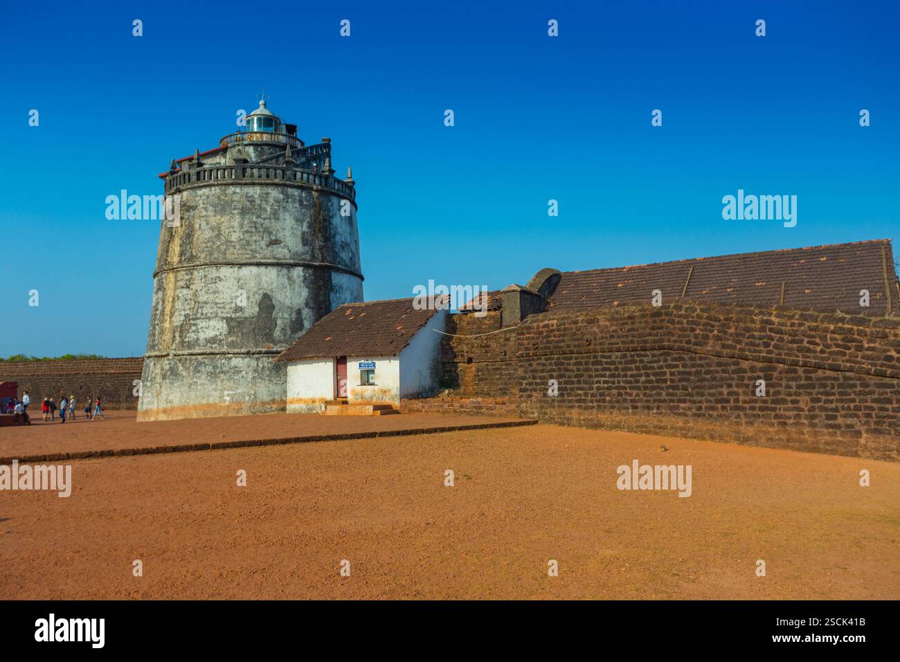 CANDOLIM, GOA, INDIA - 4 MARCH 2017: Ancient Fort Aguada and lighthouse ...
