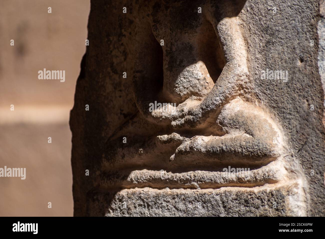 Ancient carving of a Jain monk meditating on a pillar of an old temple ...