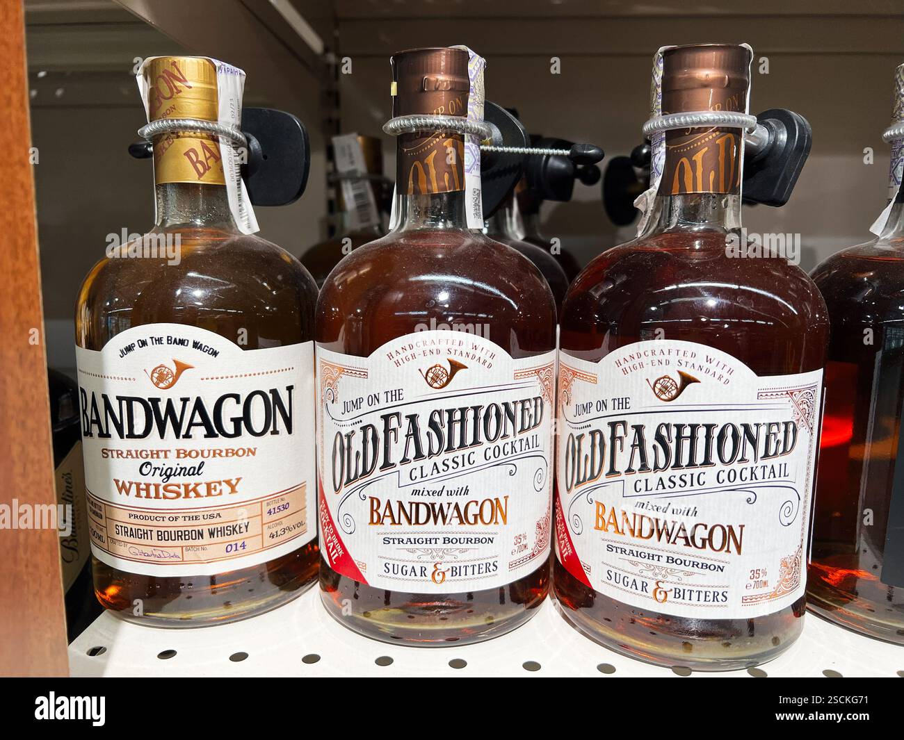 Kyiv, Ukraine - February 04, 2025: Display of Bandwagon whiskey bottles ...