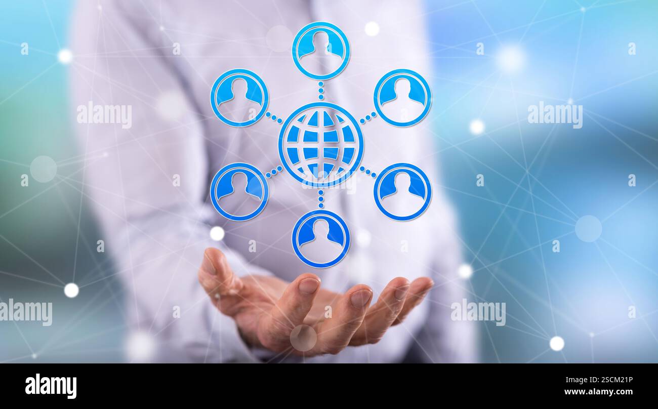 Globalization concept above the hand of a man in background Stock Photo ...