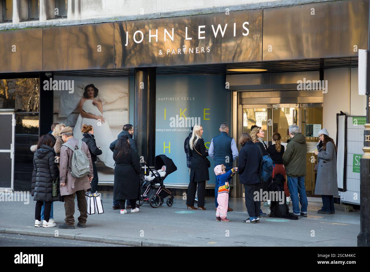 People queue outside john lewis department store hi-res stock ...