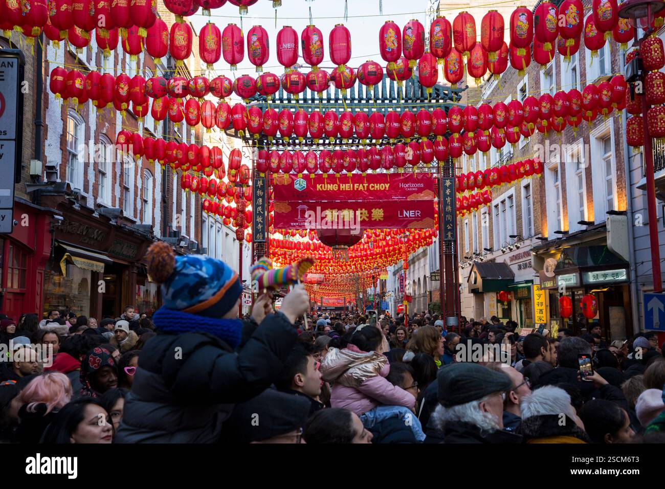 Chinese lanterns decorate Chinatown Gerrard Street / roads streets for Chinese New Year ...
