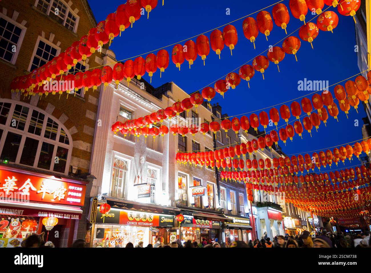 Chinese lanterns decorate Chinatown Gerrard Street / roads streets for Chinese New Year ...