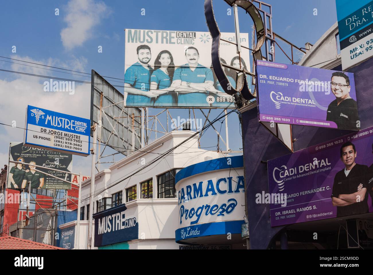 Signs for businesses, pharmacies, dentists in Nuevo Progreso, Mexico ...