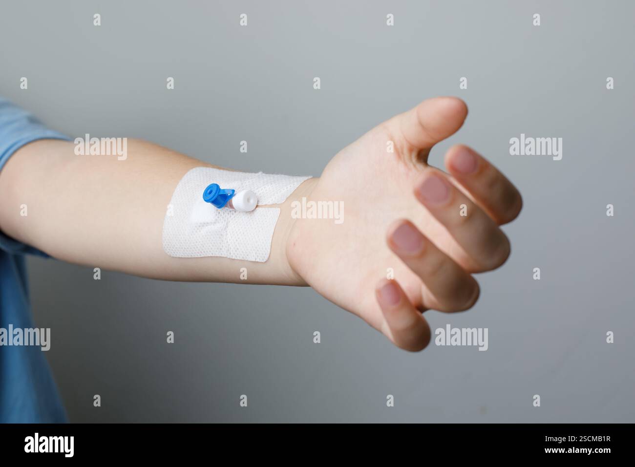 Hand with Peripheral venous catheter in hospital closeup Stock Photo ...