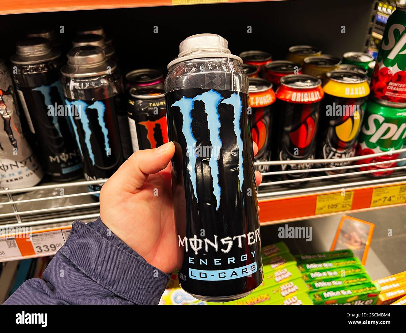 Kyiv, Ukraine - February 04, 2025: Close-up of a hand holding a Monster ...