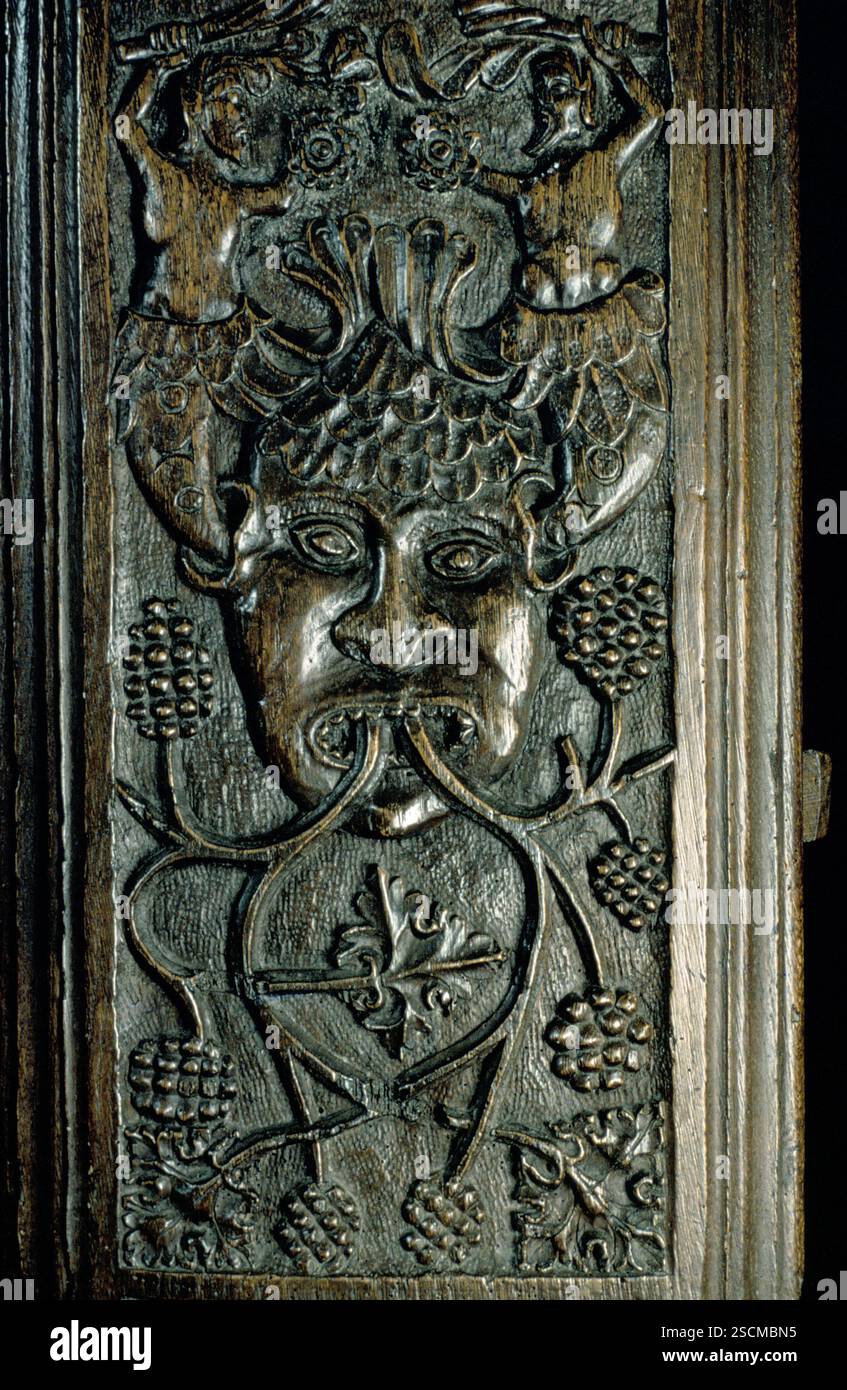 Green Man church pew bench end. Interior of the 16th century 'Church of ...
