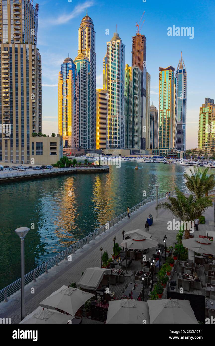 DUBAI, UAE - NOVEMBER 14: High rise buildings and streets. Dubai was ...