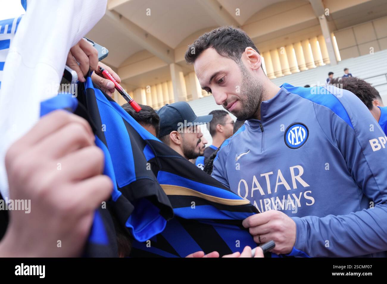 Inter Milan's Hakan Calhanoglu signs autographs at Al Riyadh stadium ...