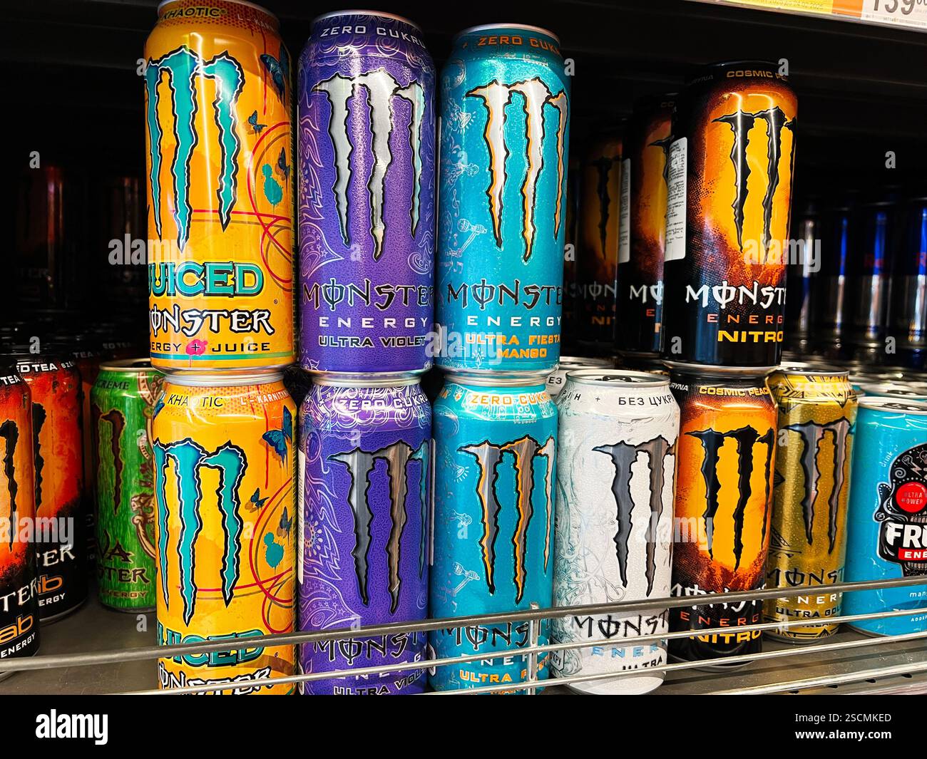 Kyiv, Ukraine - February 04, 2025: Assorted Monster energy drinks with ...