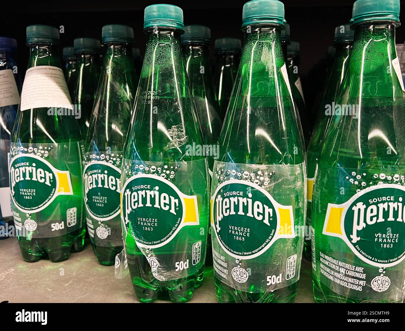 Kyiv, Ukraine - February 04, 2025: Close-up view of green Perrier ...
