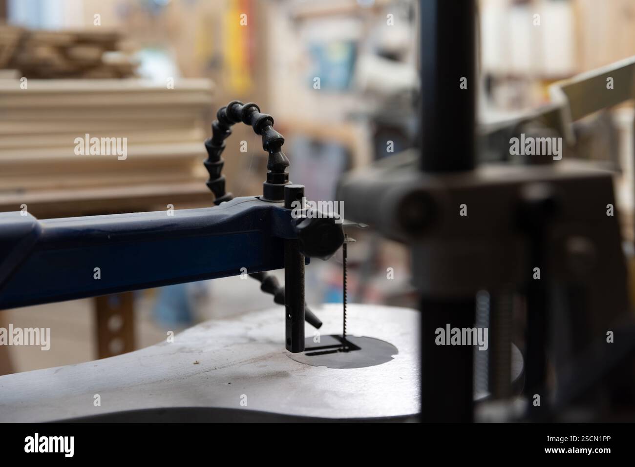 Details on a carpenter atelier working with different tools and ...
