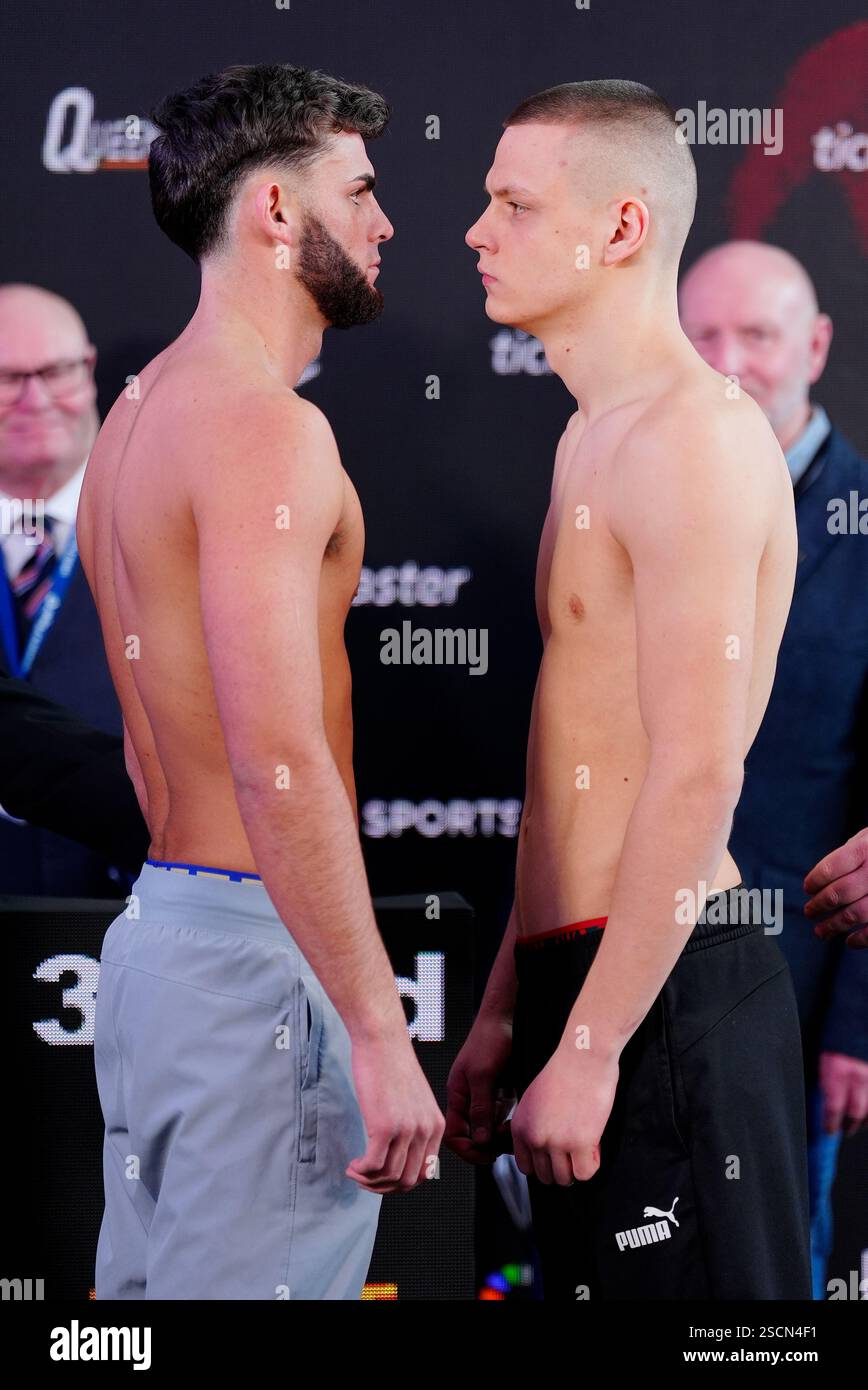Joe Cooper (centre left) and Artjom Spatar face off during the weigh-in ...