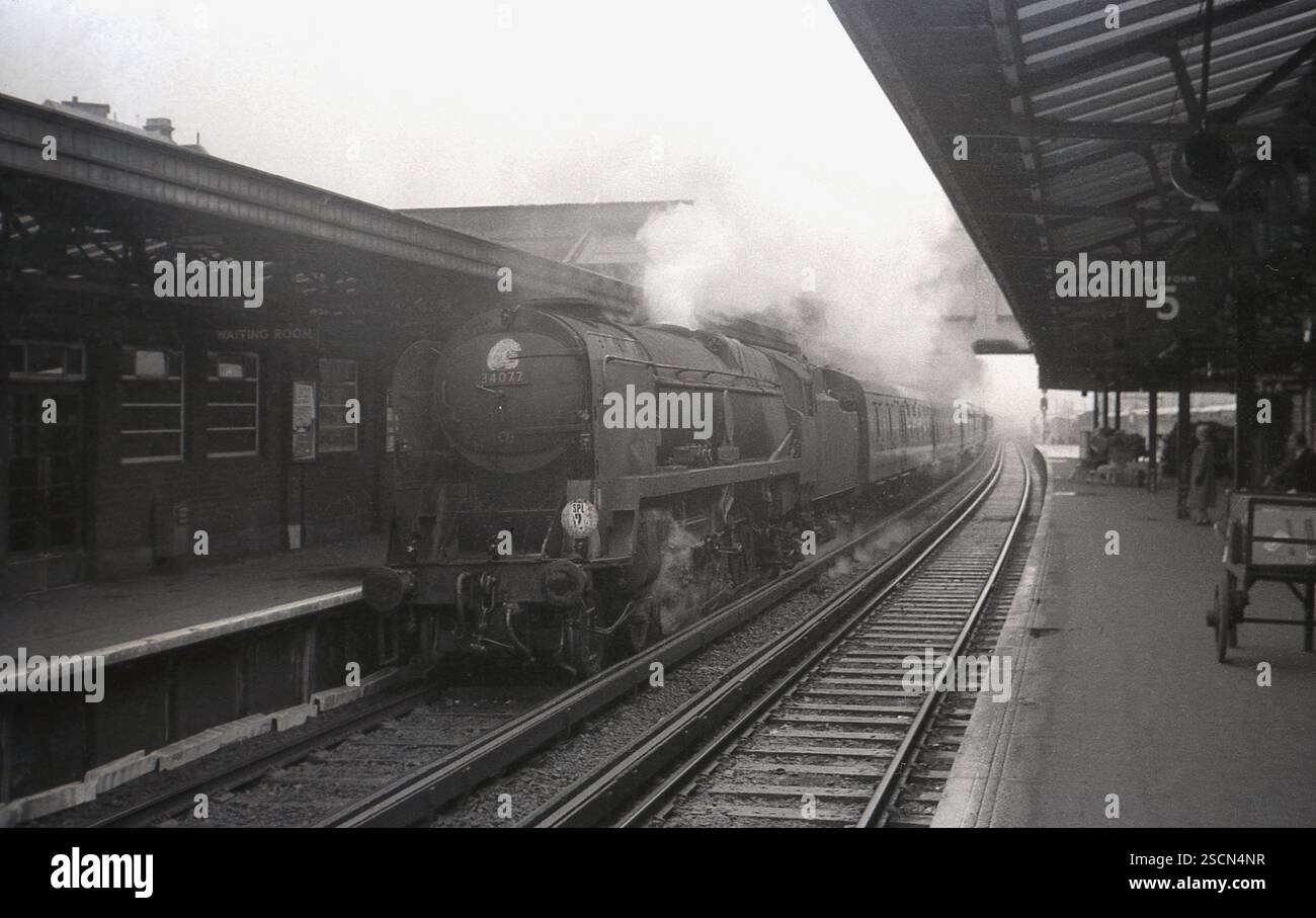 1950s, historical, steam locomotive 30477 at a railway station, England ...