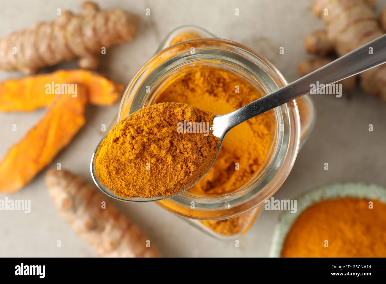 Taking aromatic turmeric powder hi-res stock photography and images - Alamy