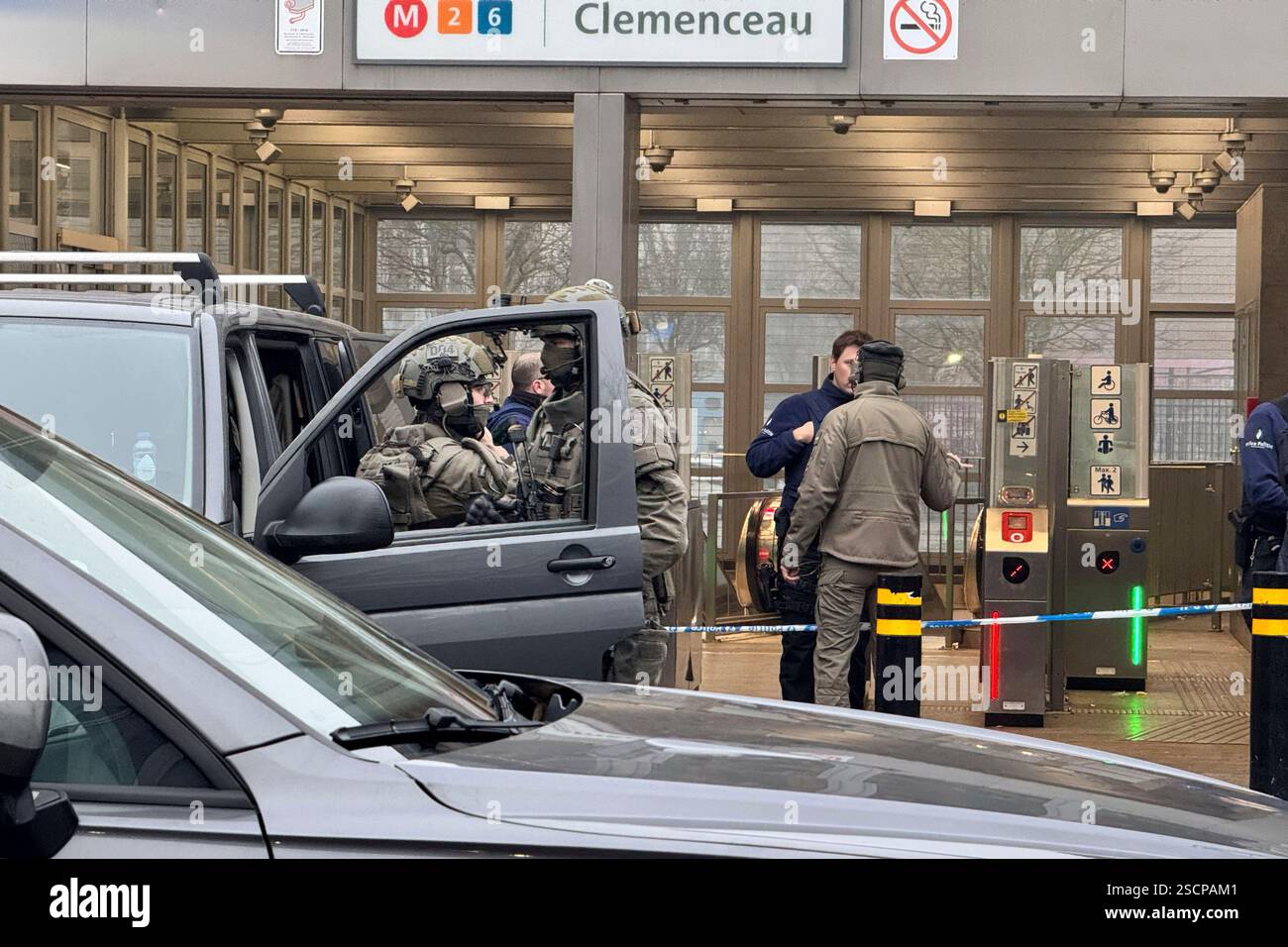 Police work in an area around the Clemenceau metro station after a shooting incident in Brussels ...