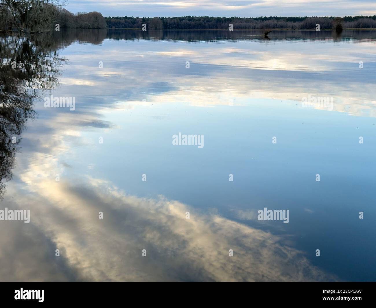 Serene reflection fluffy clouds in hi-res stock photography and images - Alamy