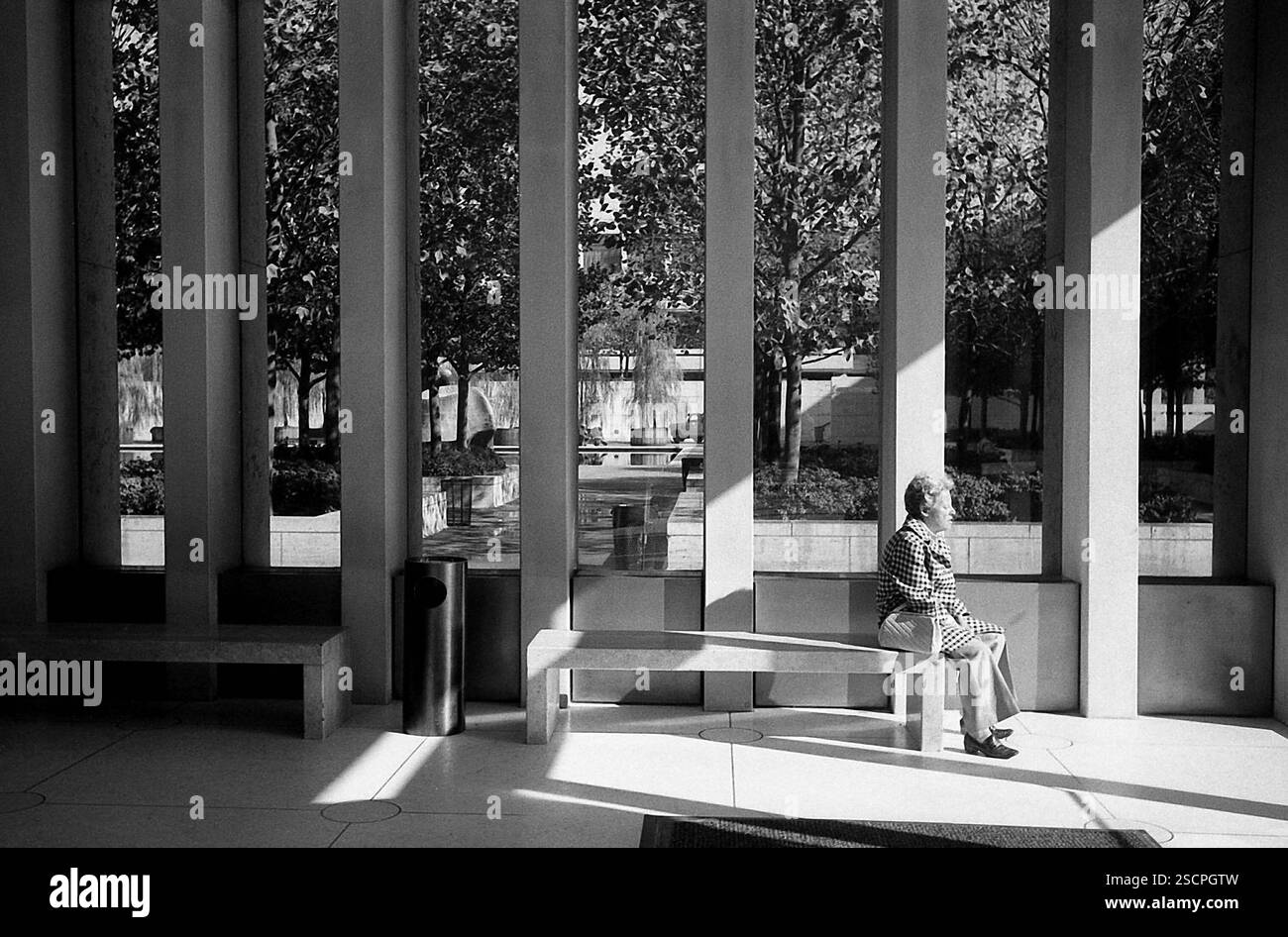 Lincoln Center Plaza in New York: Picture shows a woman on a bench in ...
