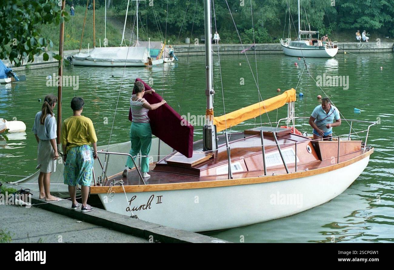 Vacationers pack everything on the sailing boat Lurch II. This photo ...