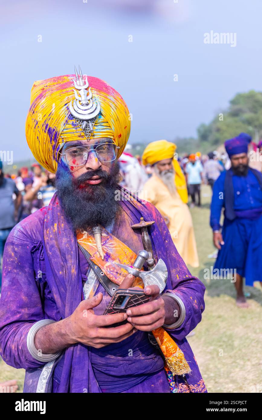 Group of sikh people (Nihang Sardar) performing martial arts during the ...
