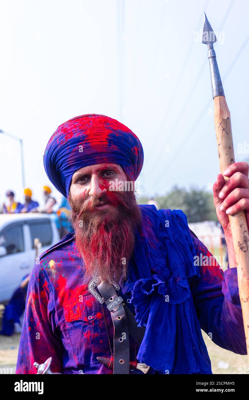 Group of sikh people (Nihang Sardar) performing martial arts during the ...