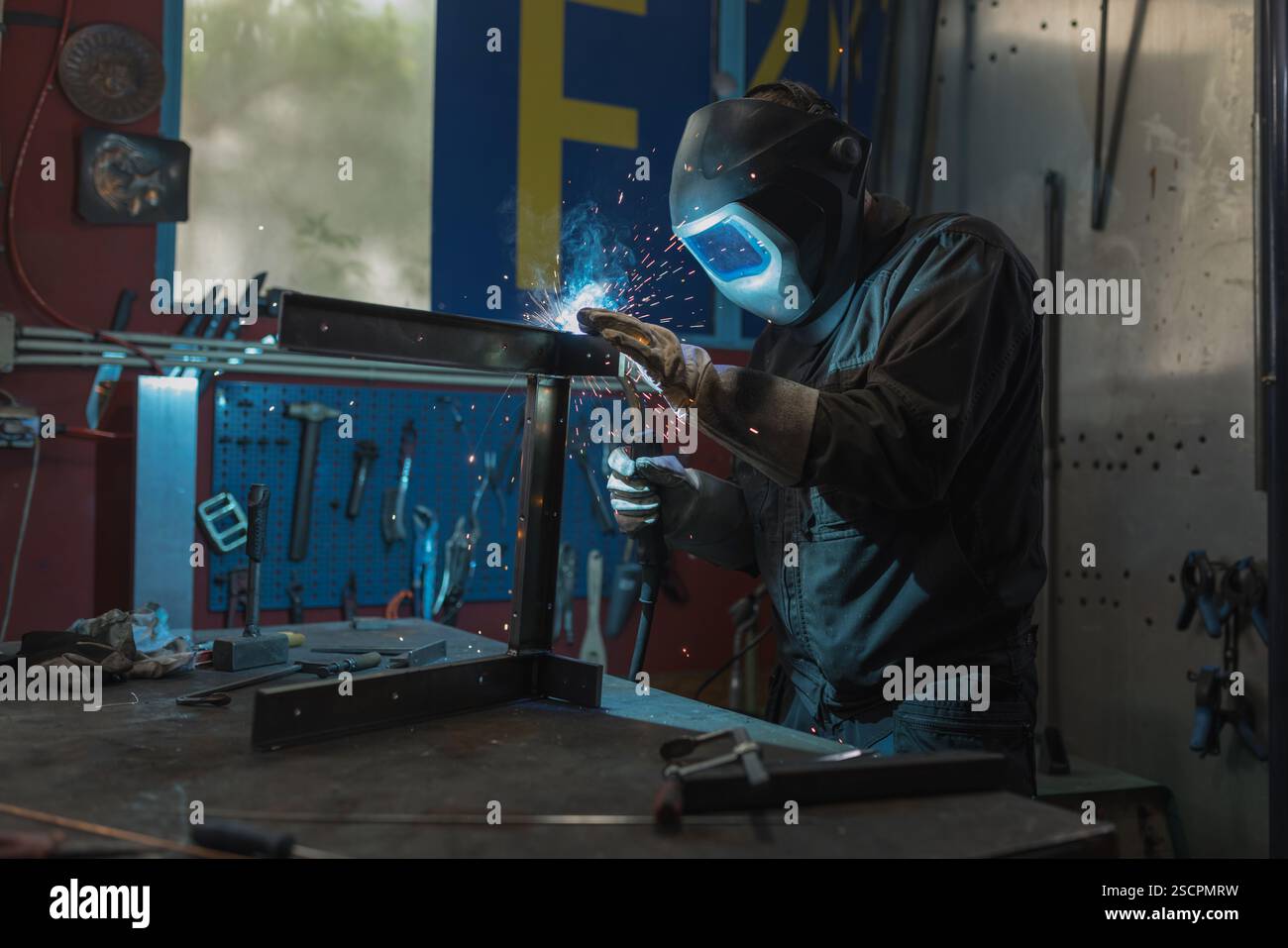 Experienced and skilled professional welder during the dangerous ...