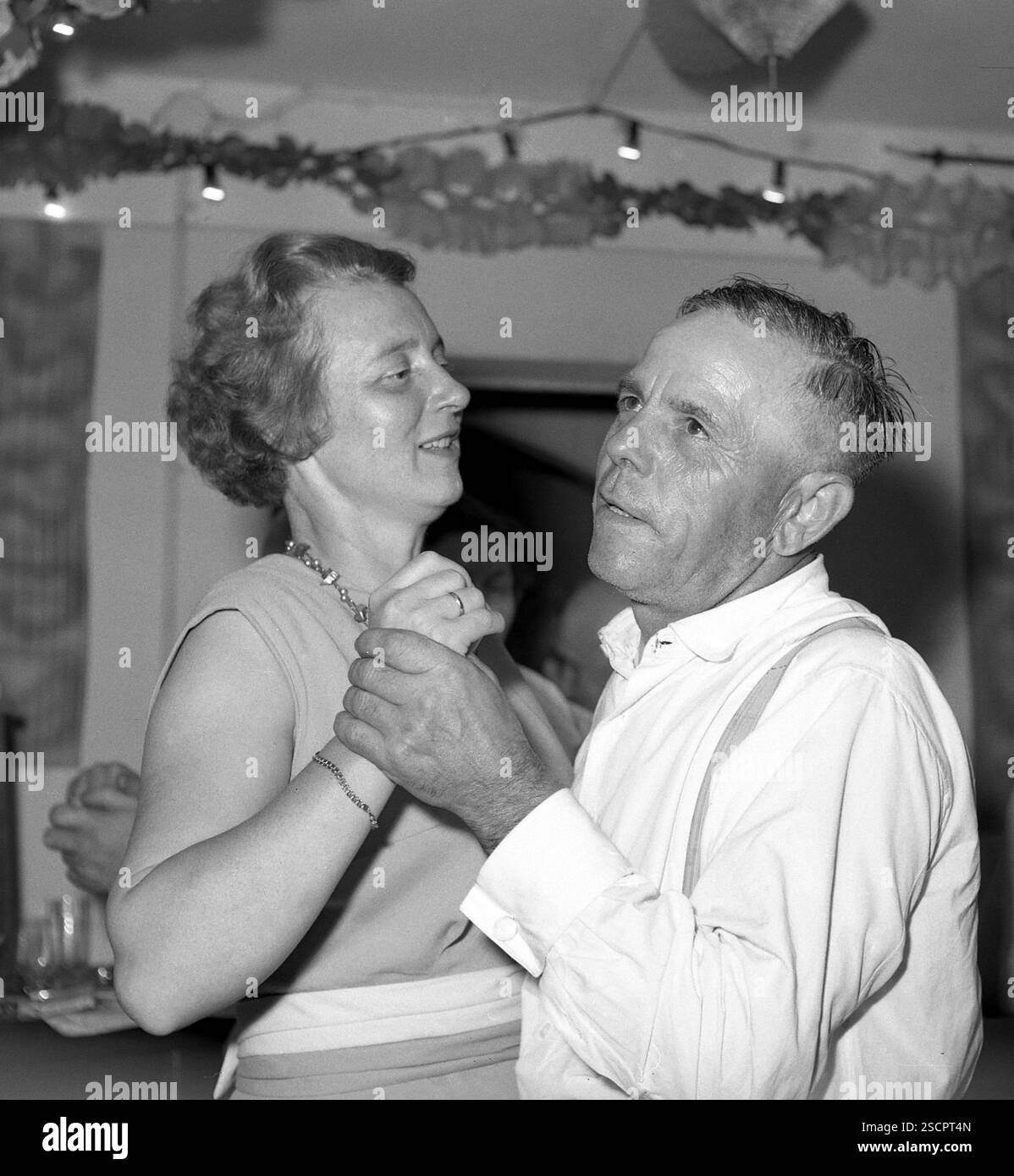 A couple dancing at a wedding reception in Bad Saarow. [automated ...