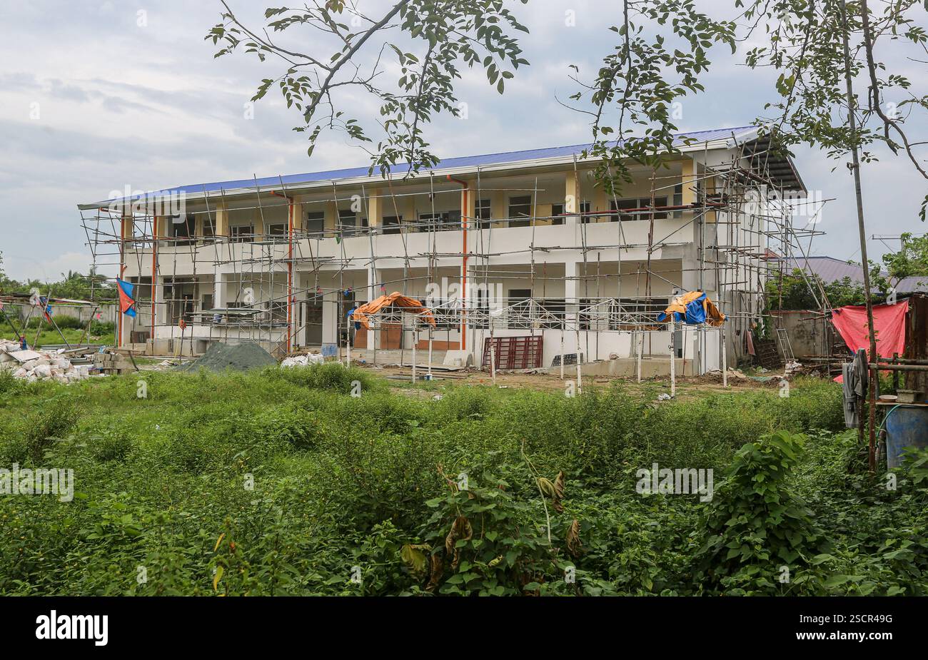 New school building under construction, rural Philippines, part of ...
