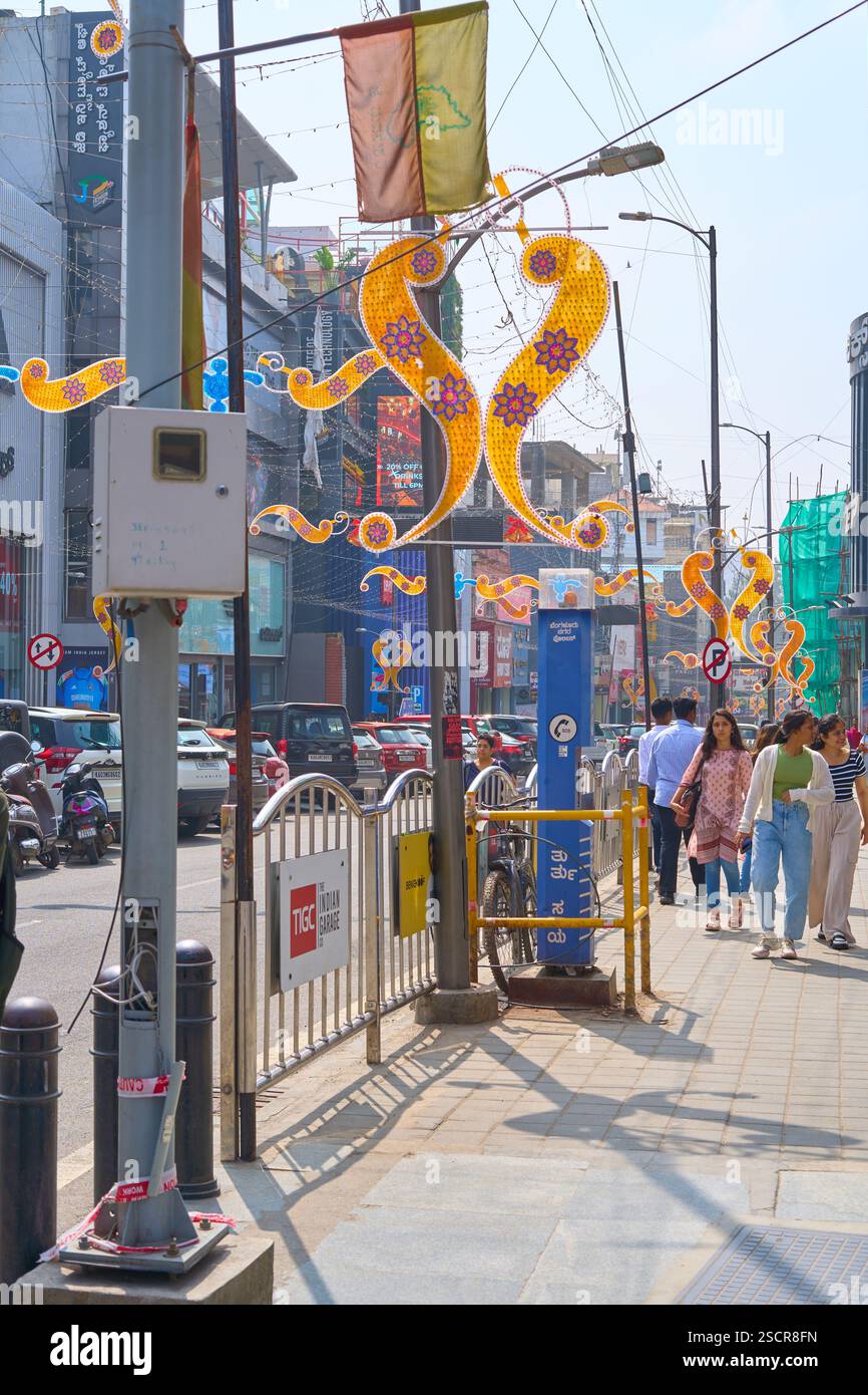 A vibrant street scene in Bangalore, India, featuring colorful ...