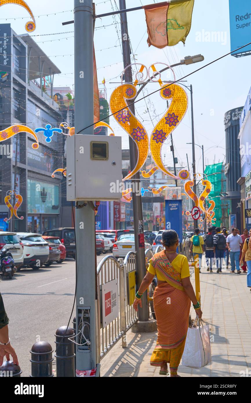 A vibrant street scene in Bangalore, India, featuring colorful ...