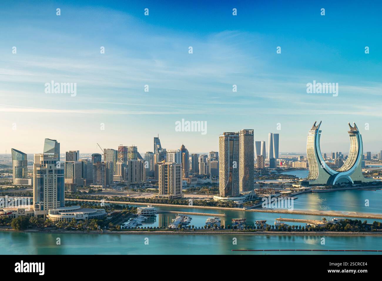 Katara buildings view from Lusail Marina Park. Crescent Tower Stock ...