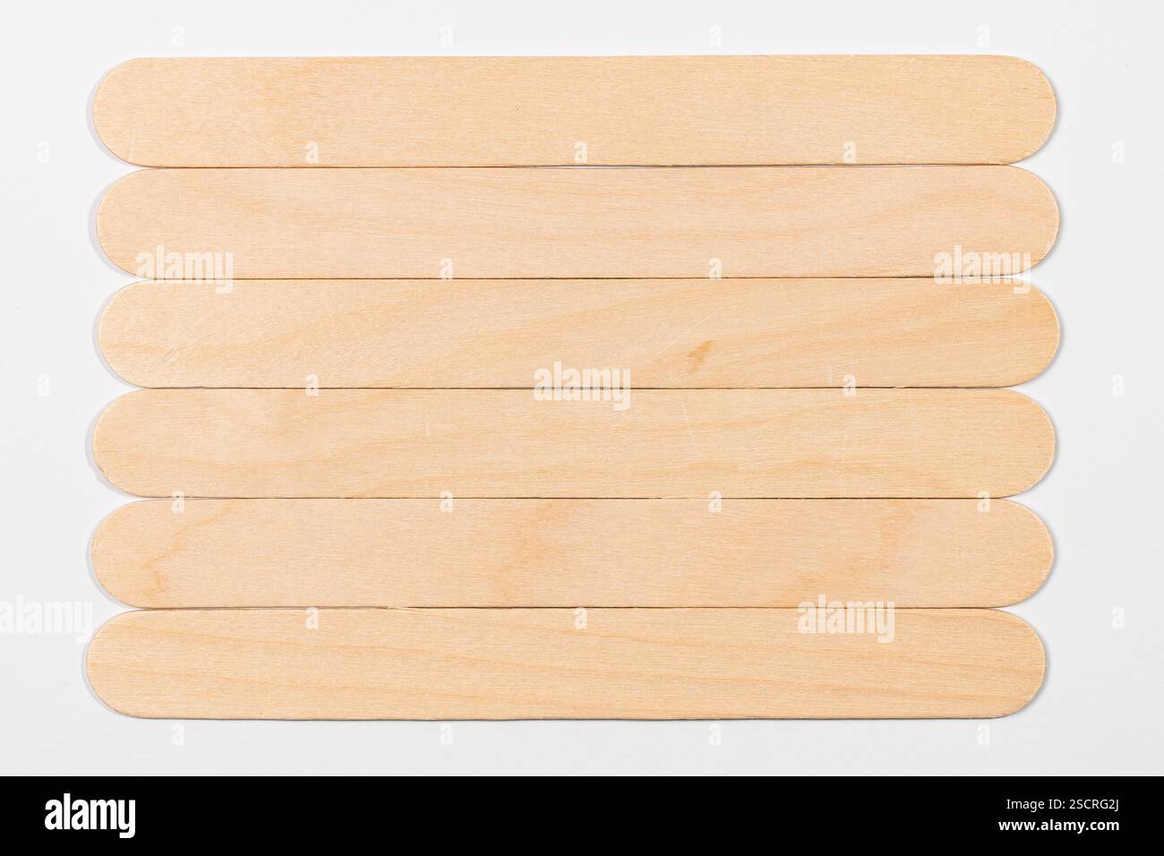 six natural wood popsicle sticks on white background can be used as a ...