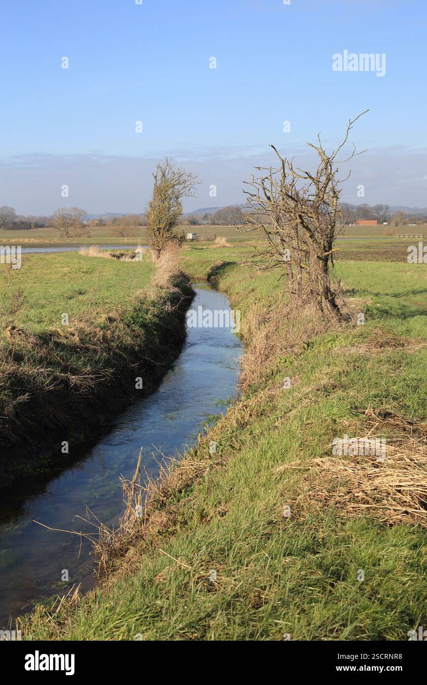 Drainage ditch with fresh flowing water outside Wye, Ashford, Kent ...