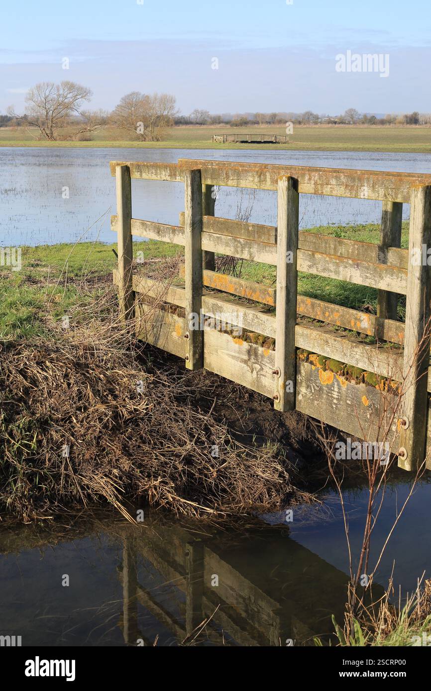 Flooding in feld and footbridge, Wye, Ashford, Kent, England Stock ...