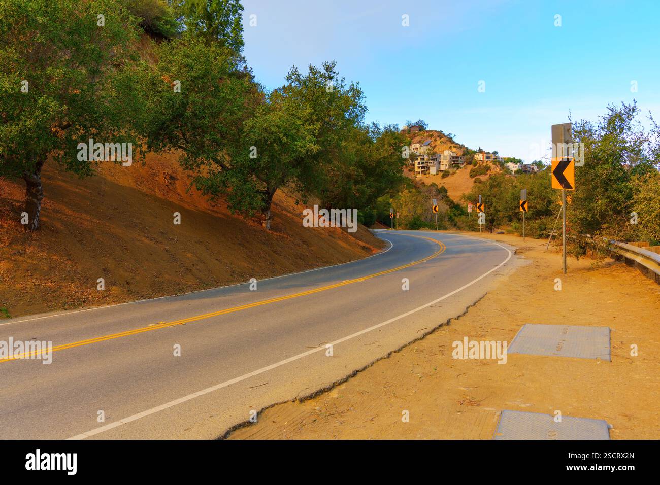 Los Angeles, California - January 8, 2025: Winding road surrounded by ...
