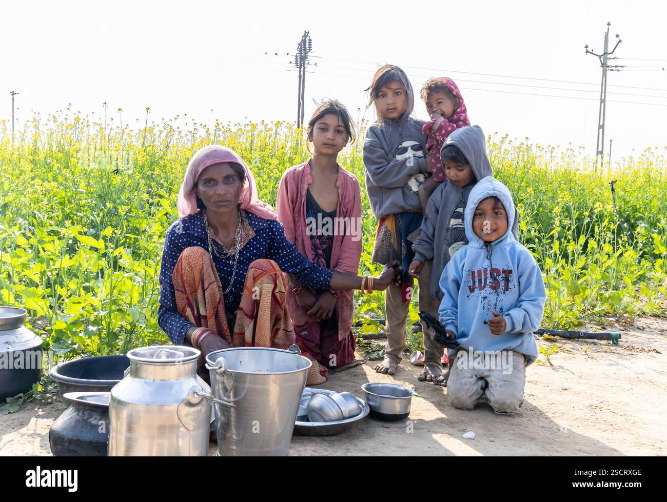 struggling mother with kids facing poverty in daylight image is taken ...