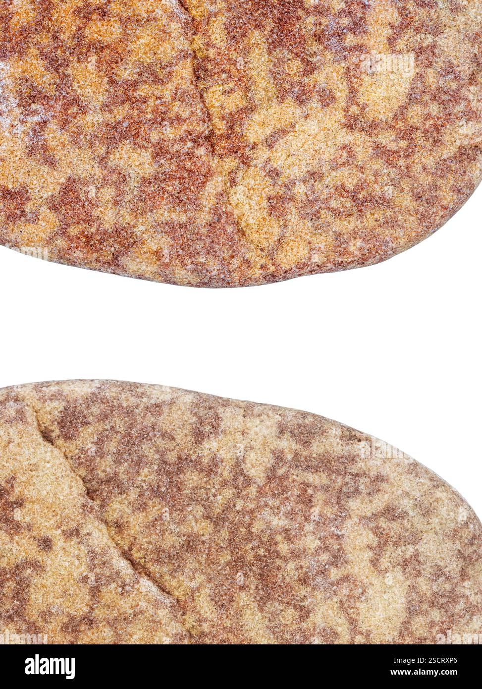 Edges of two pebbles isolated on white background with a space for text ...