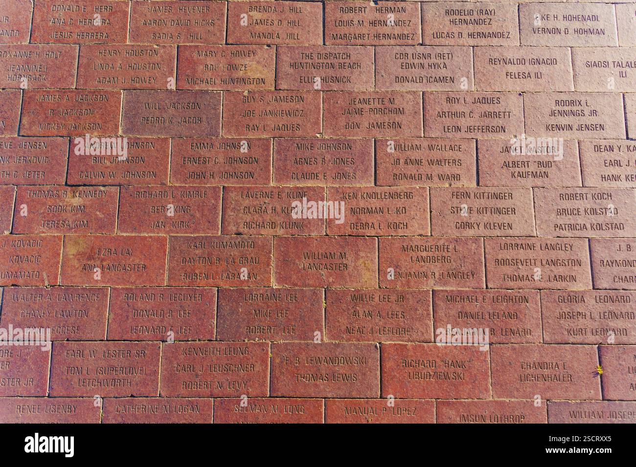 Long Beach, California - January 15, 2025: Close-up of engraved bricks ...
