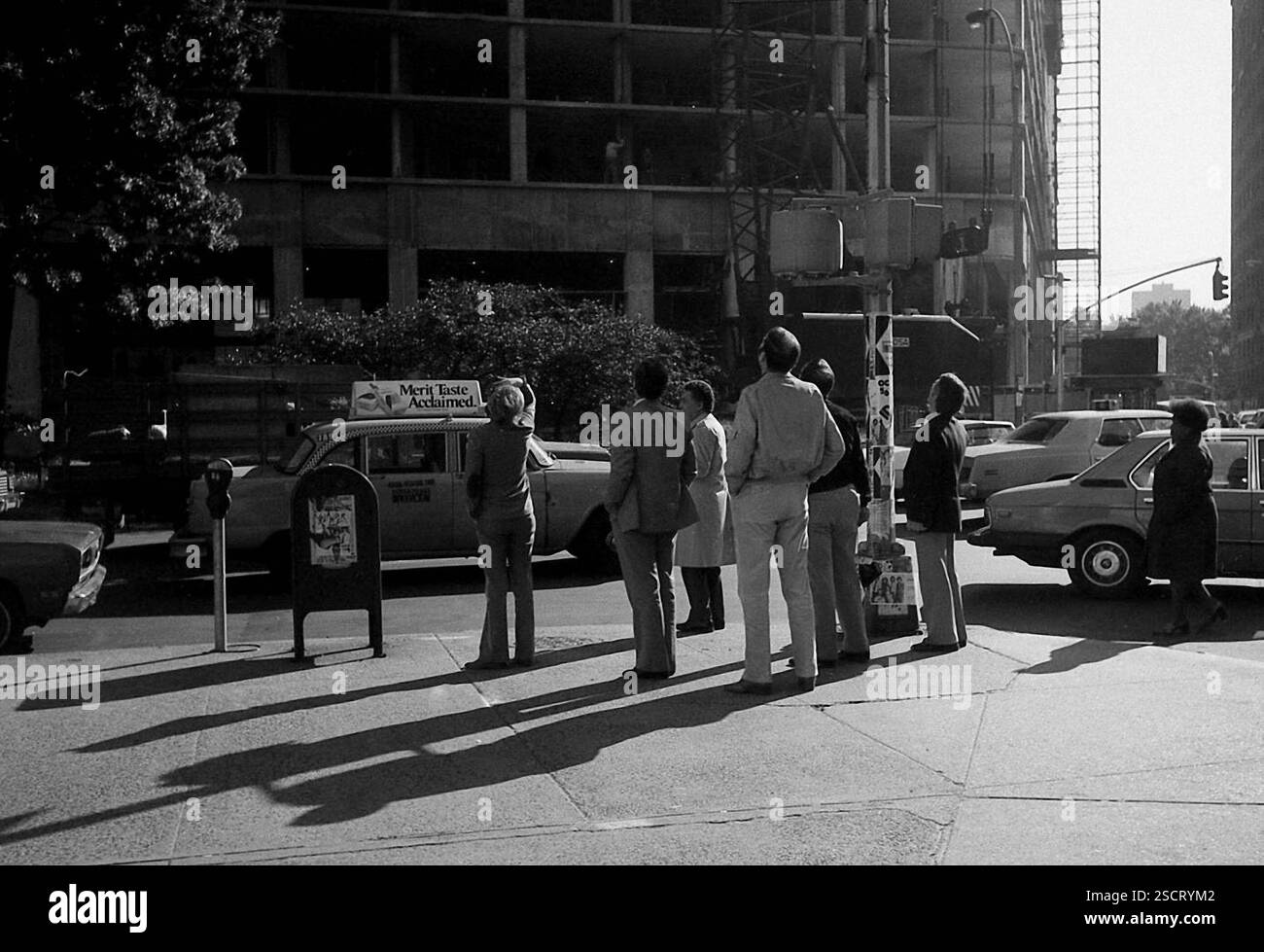 Manhattan New York: Image shows pedestrians at an intersection looking ...