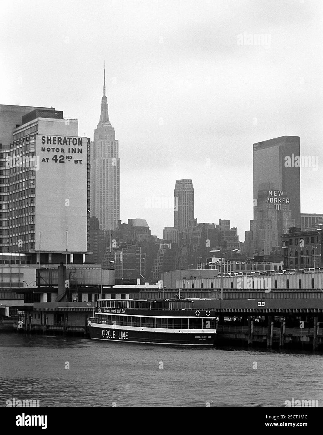 A Circle Line boat on the docks of the Hudson River in New York City ...