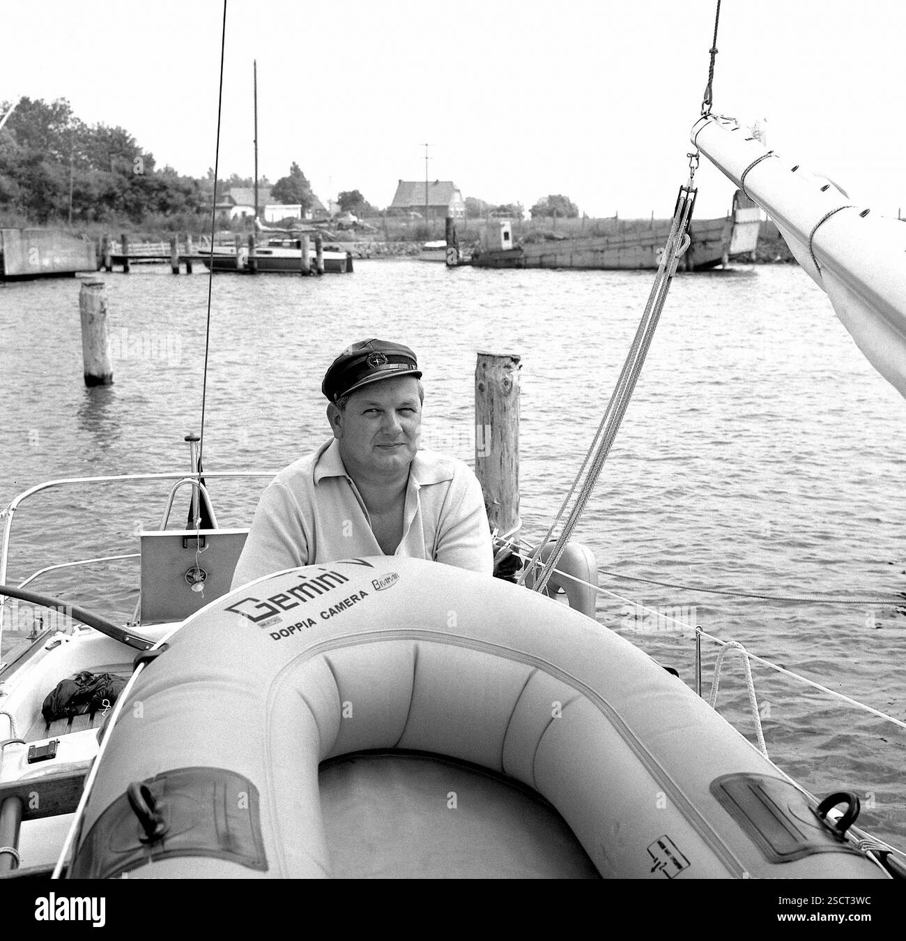 A satisfied looking skipper on the sailing boat 'Roxi III'. [automated ...