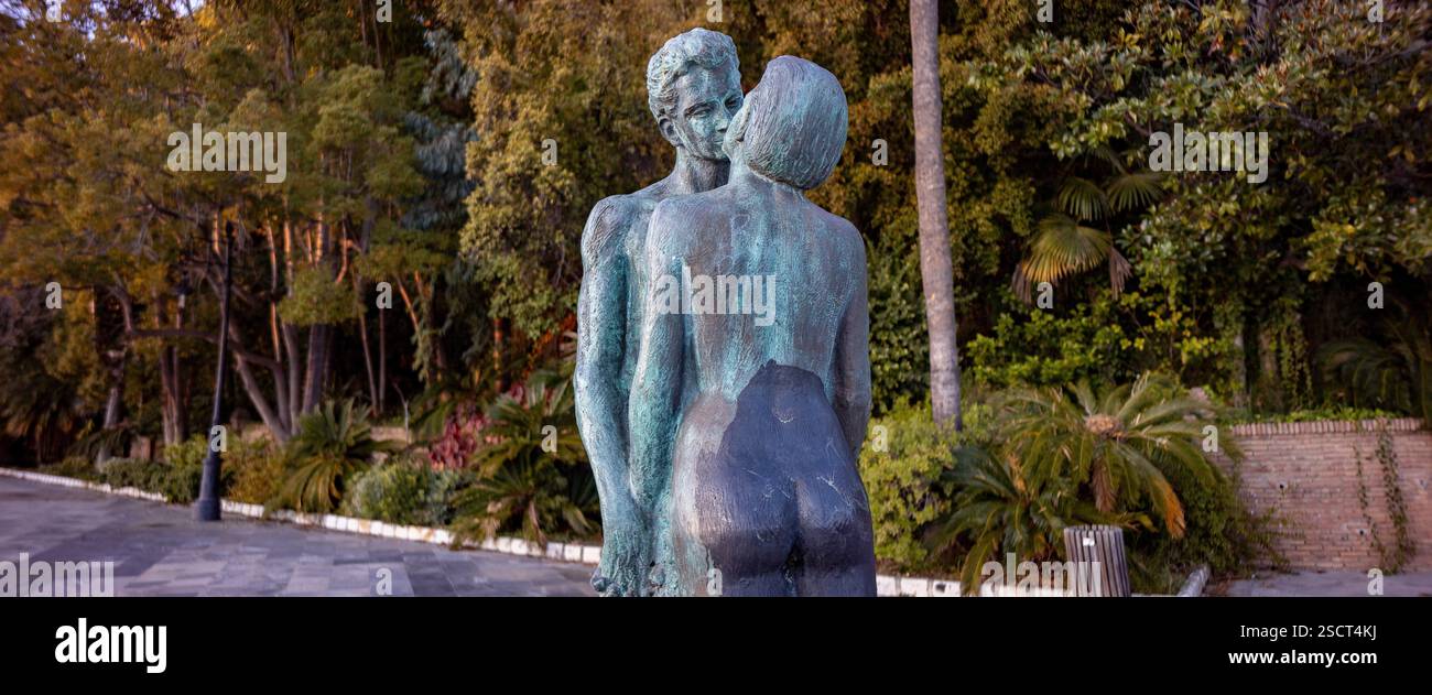 Bronze sculpture statue in public square depicting intimacy of male and ...